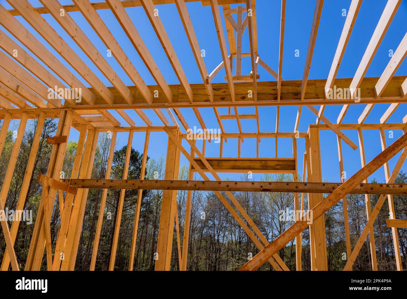 New house is being constructed under construction with joists trusses ...