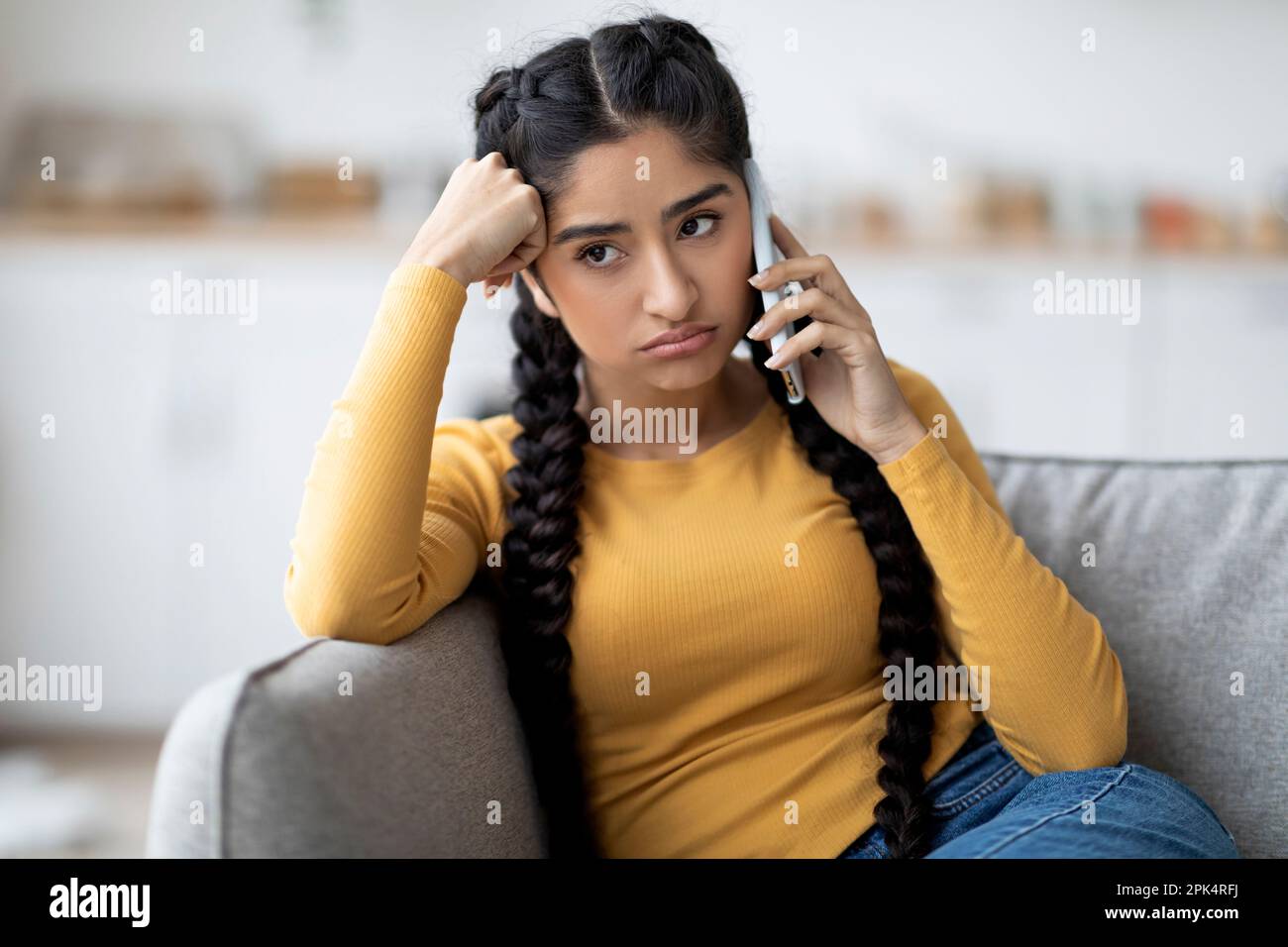 Tired bored indian woman talking hi-res stock photography and images ...