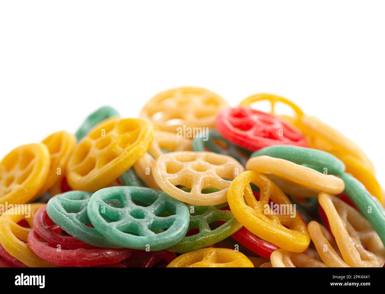 Uncooked Wheel Fryums Isolated on a White Background Stock Photo - Alamy