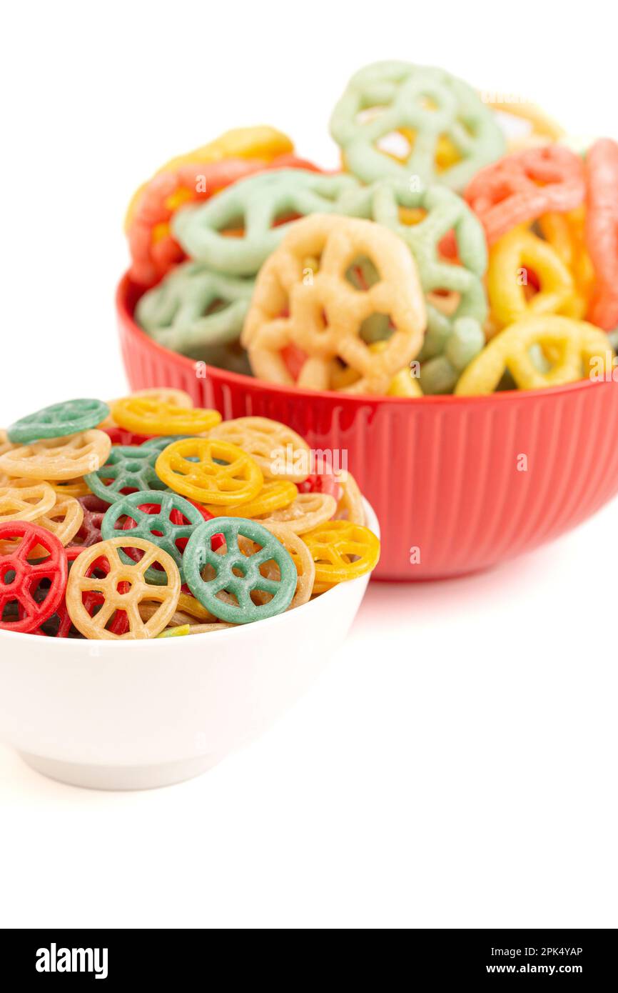 Cooked and Raw Color Rainbow Wheel Fryums Isolated on a White ...