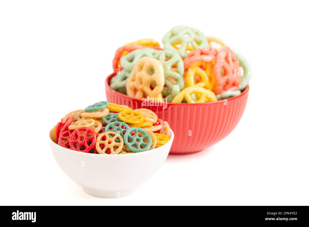 Cooked and Raw Color Rainbow Wheel Fryums Isolated on a White ...