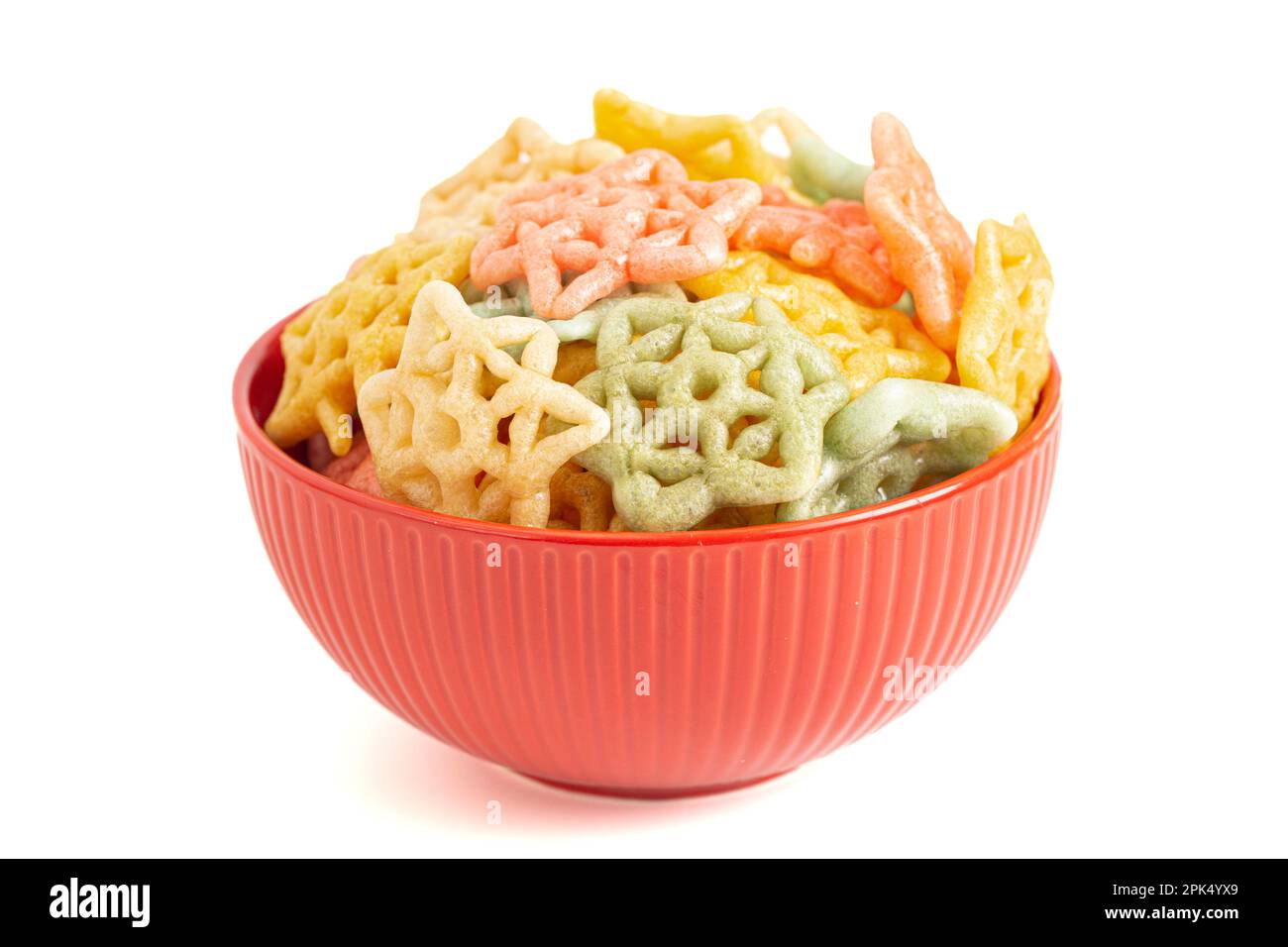 Cooked Star Shaped Fryums on a White Background Stock Photo - Alamy