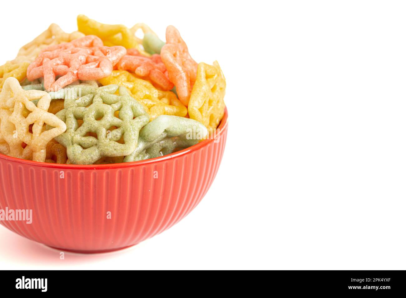 Cooked Star Shaped Fryums on a White Background Stock Photo - Alamy