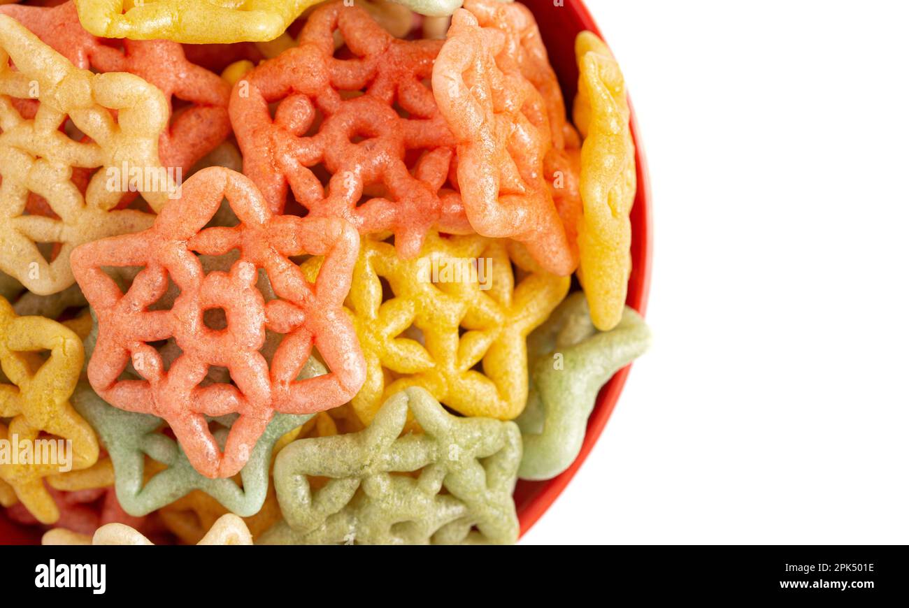 Cooked Star Shaped Fryums on a White Background Stock Photo - Alamy