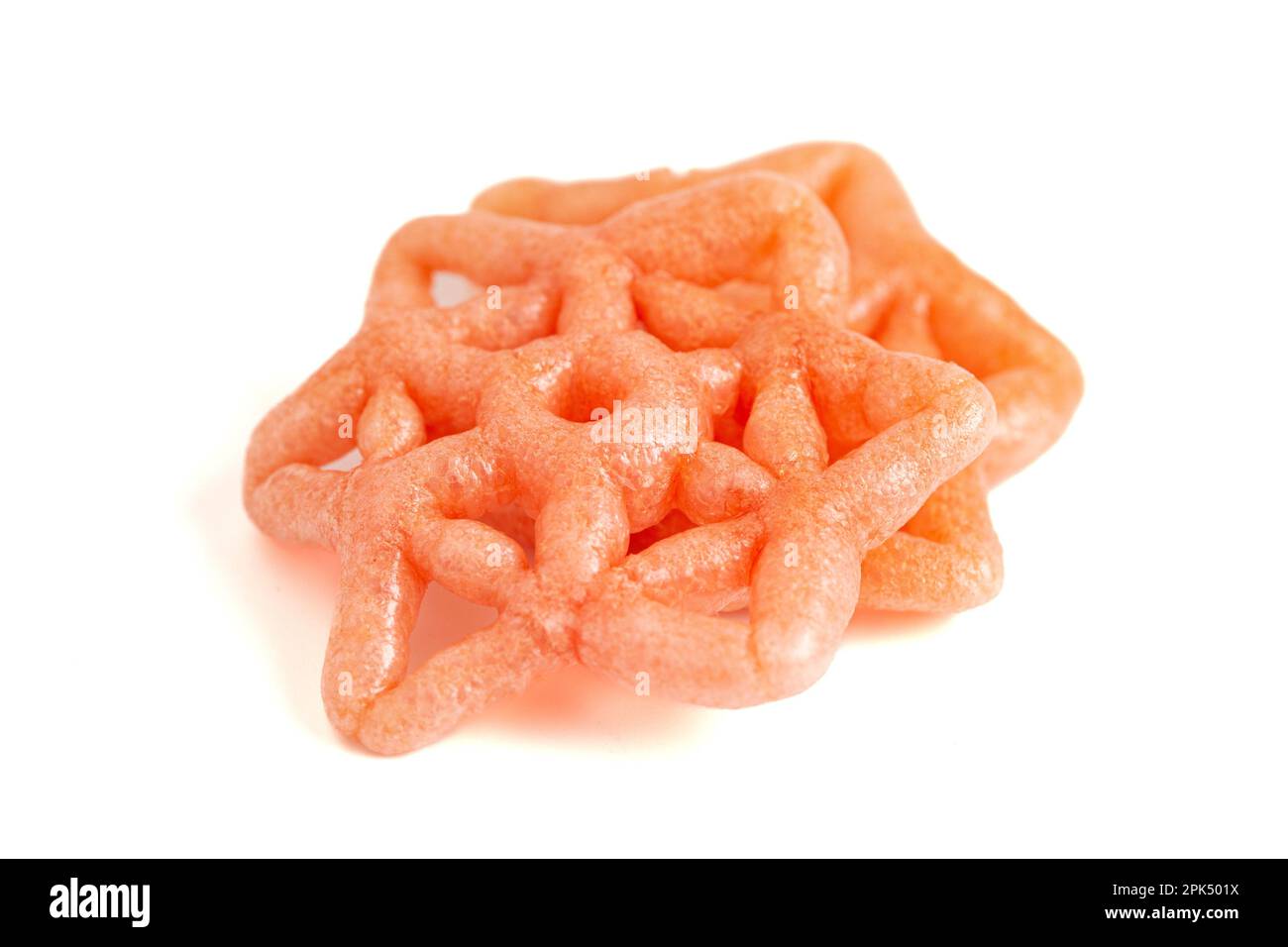 Cooked Star Shaped Fryums on a White Background Stock Photo - Alamy