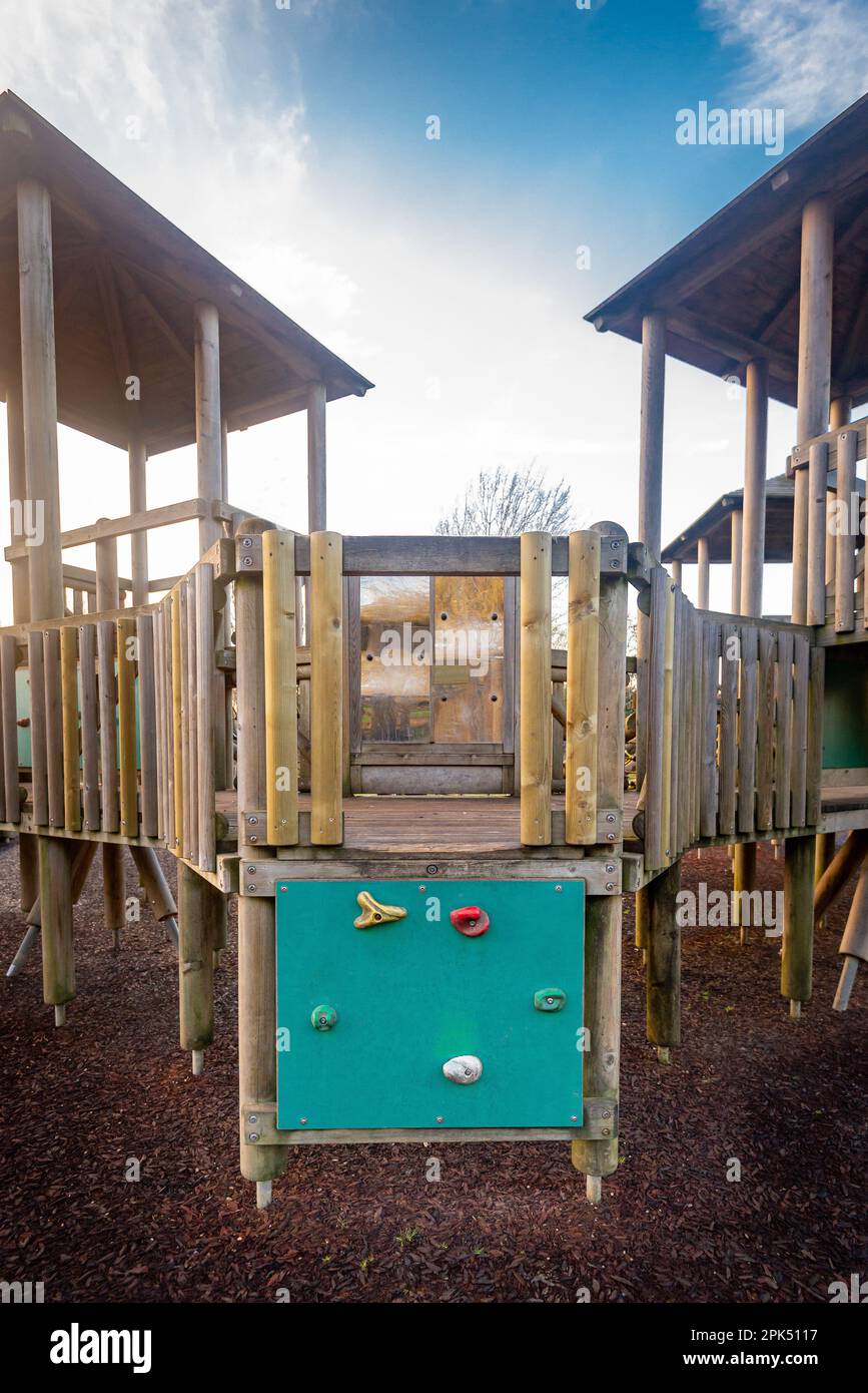 Close up of children's playground wooden play structure fort, climbing ...