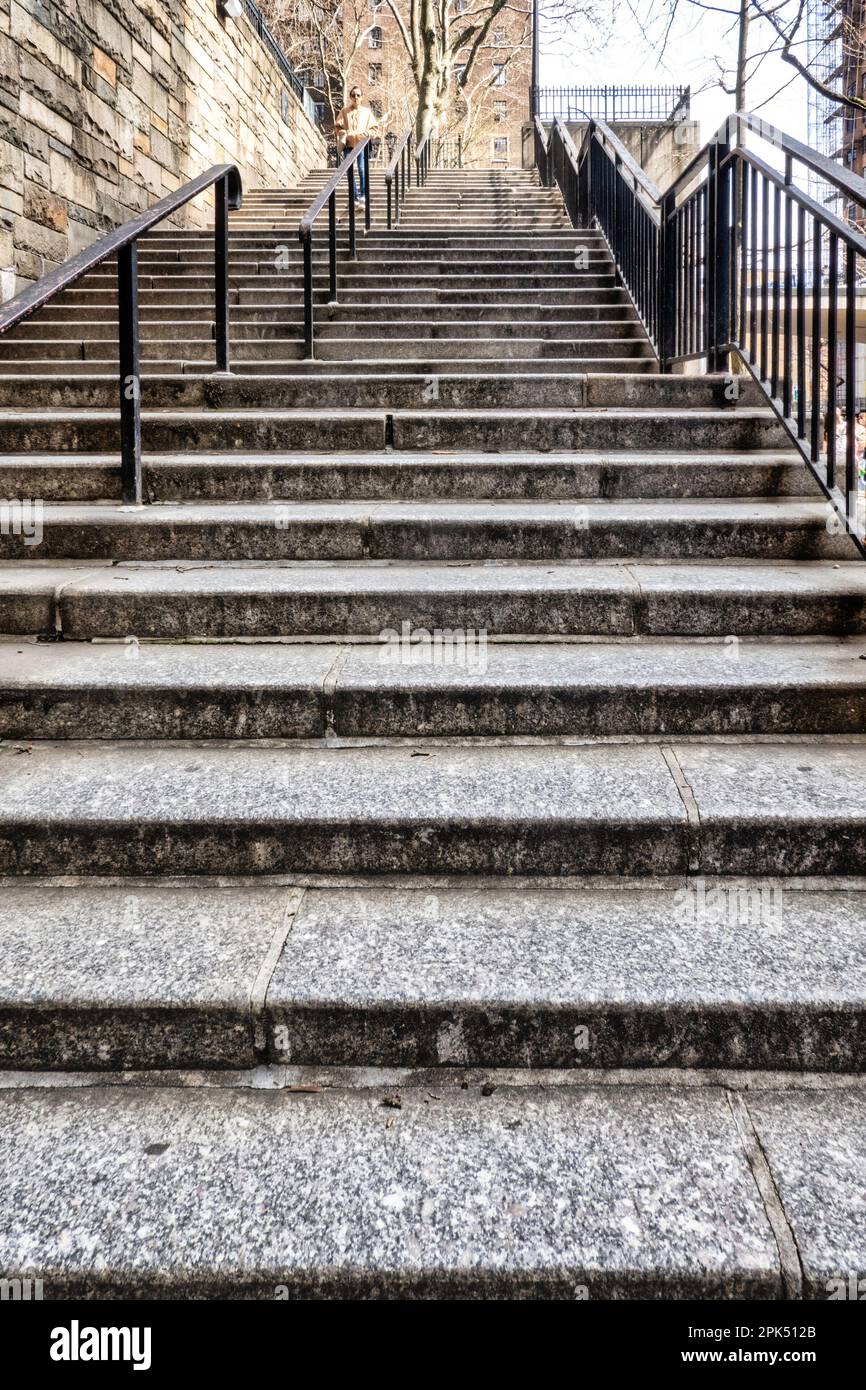 The stairs leading from the sidewalk up to Tudor City present a ...