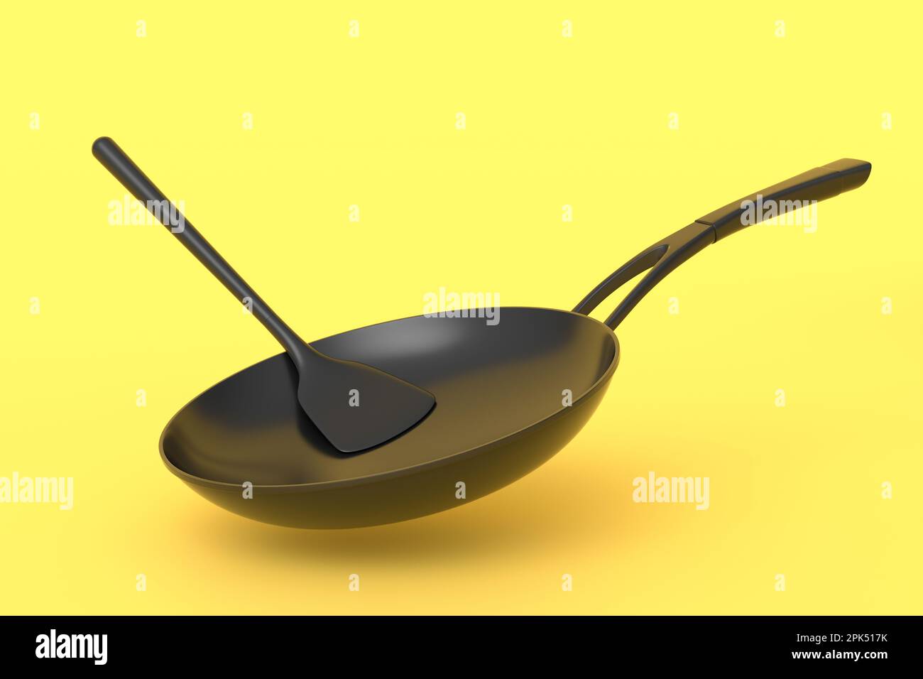 Frying pan with glass lid and silicon solid turner on monochrome ...