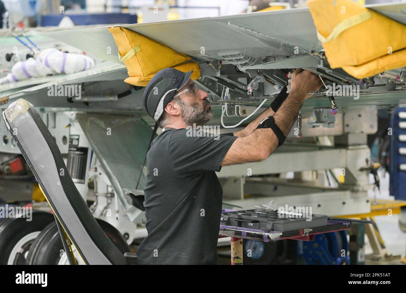 Montreal, Canada. 05th Apr, 2023. A man is shown working on the wing of ...