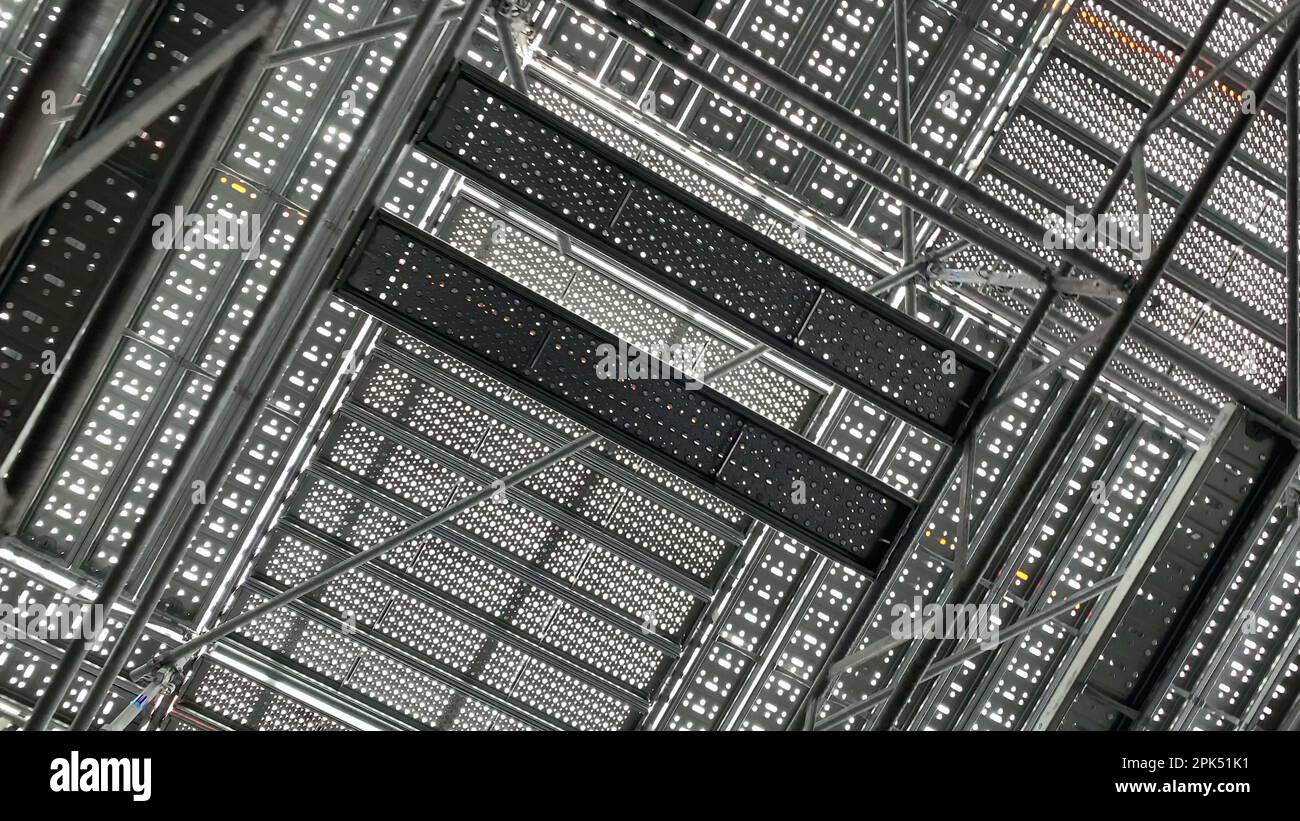 Metallic platform, chaotic patterns ceiling background Stock Photo - Alamy