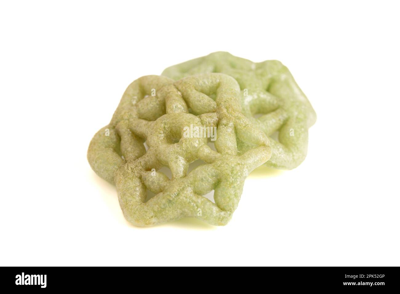 Cooked Star Shaped Fryums on a White Background Stock Photo - Alamy