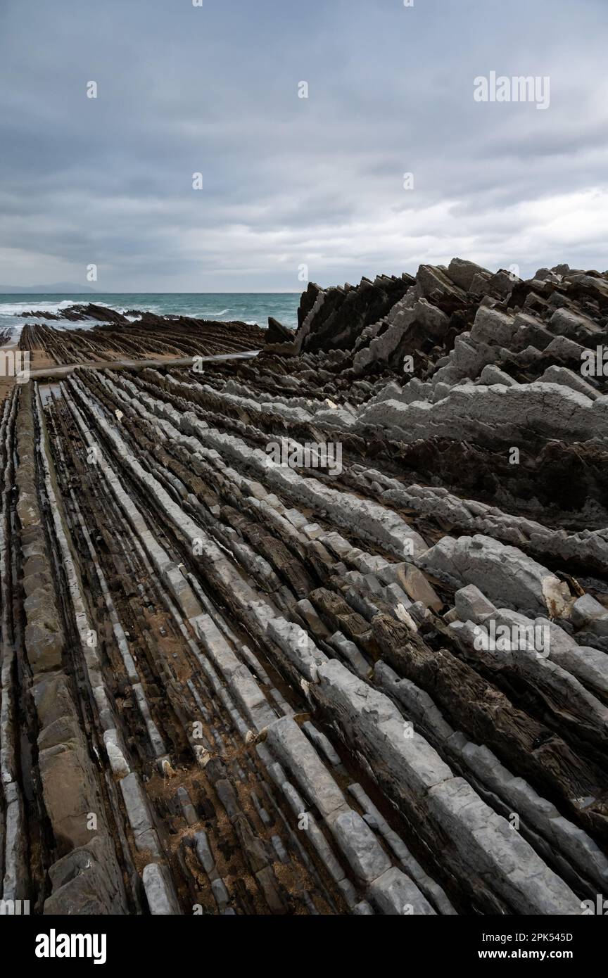 View on steeply-tilted layers of flysch geological formation on ...