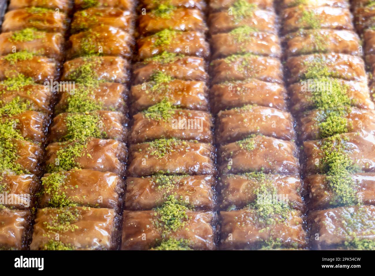 Pistachio baklava on display. Traditional Middle Eastern dessert pastry ...