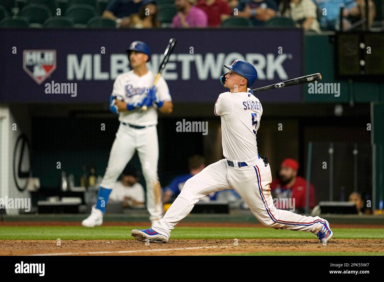 Texas Rangers' Corey Seager follows through on a swing during a ...