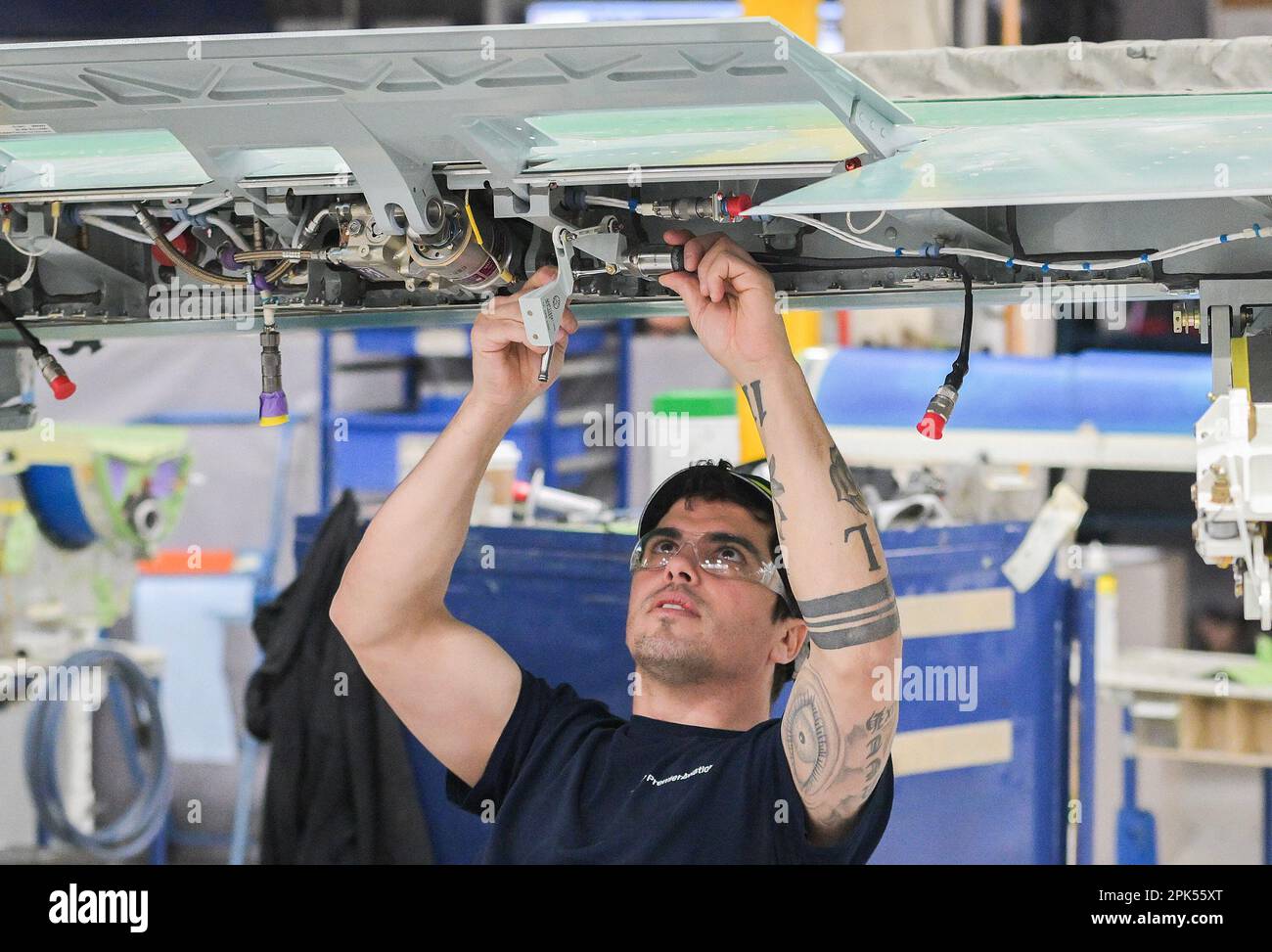 Montreal, Canada. 05th Apr, 2023. A man is shown working on the wing of ...