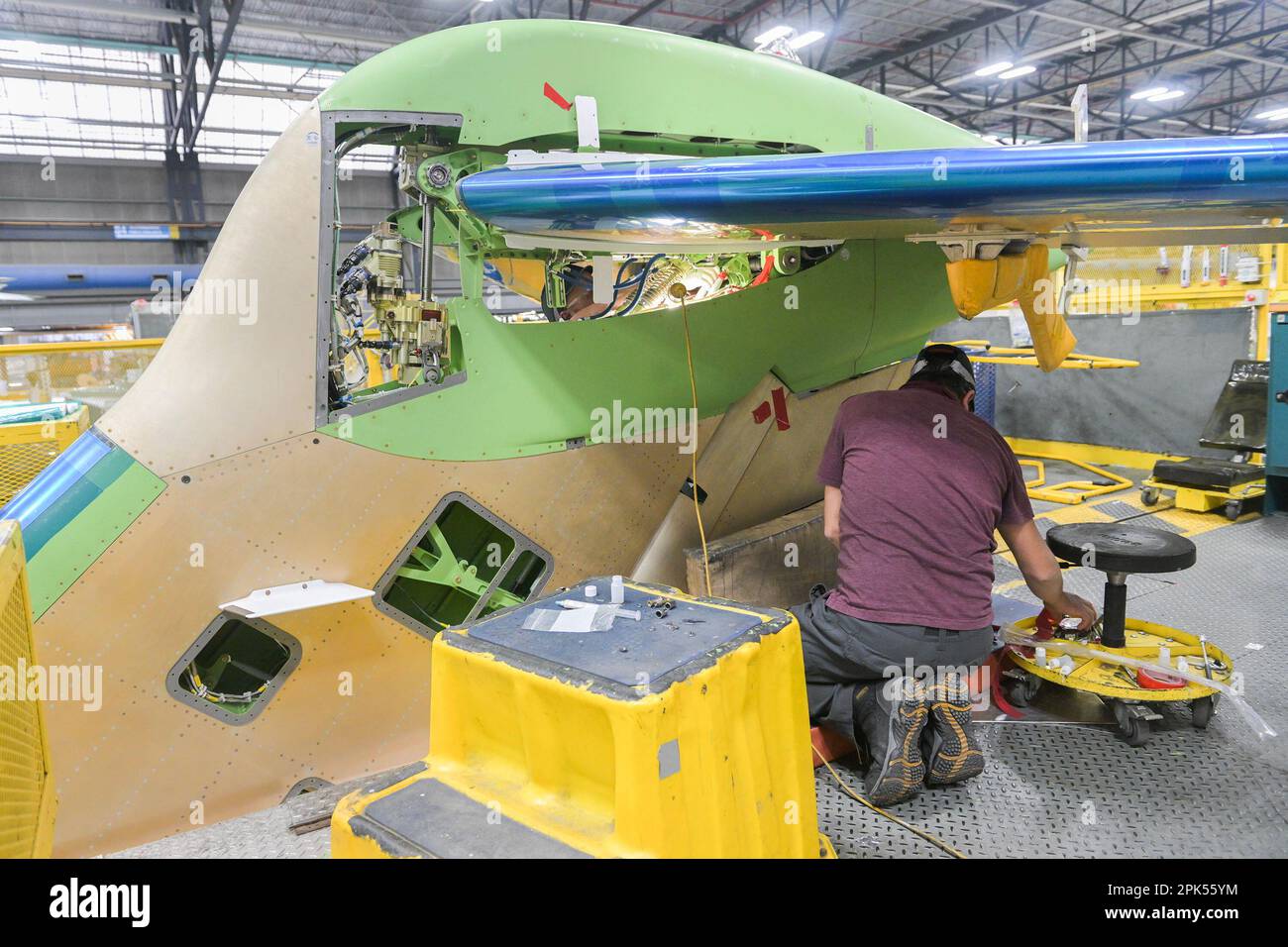 Montreal, Canada. 05th Apr, 2023. A man works on part of a wing of a ...