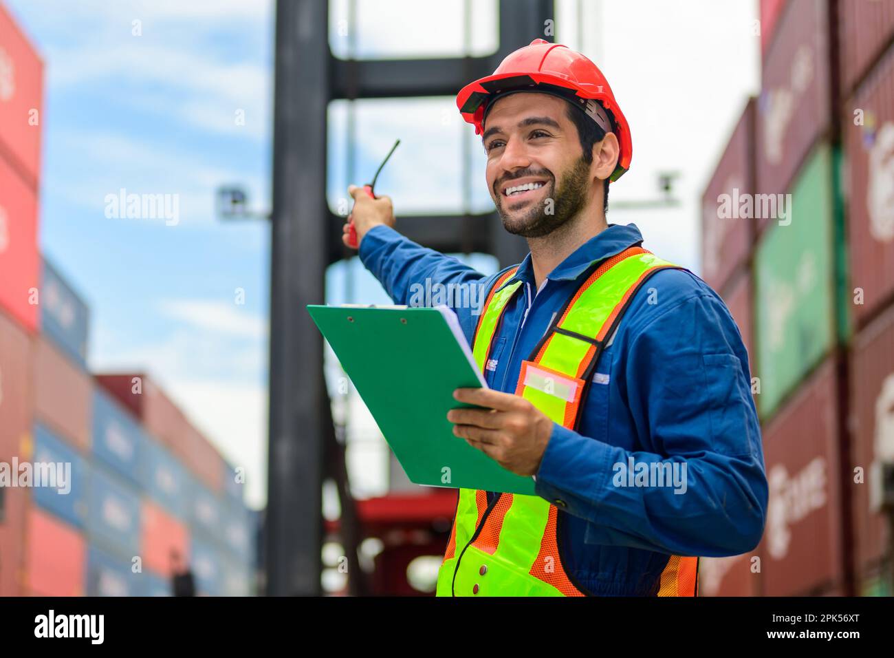 Warehouse engineer worker working at industrial container yard Stock ...
