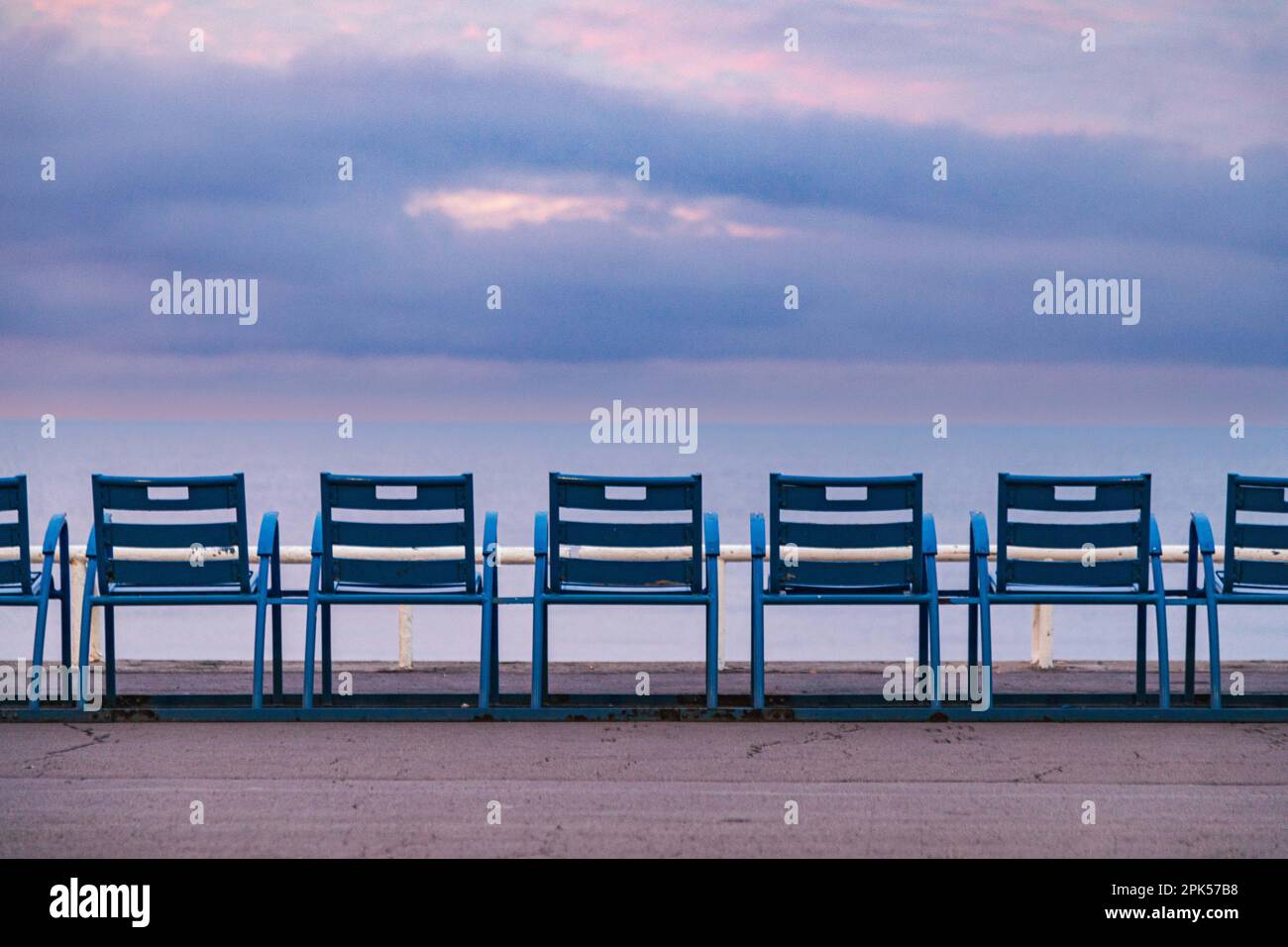 Blue Chair on the Promenade des Anglais, Nice France Stock Photo - Alamy
