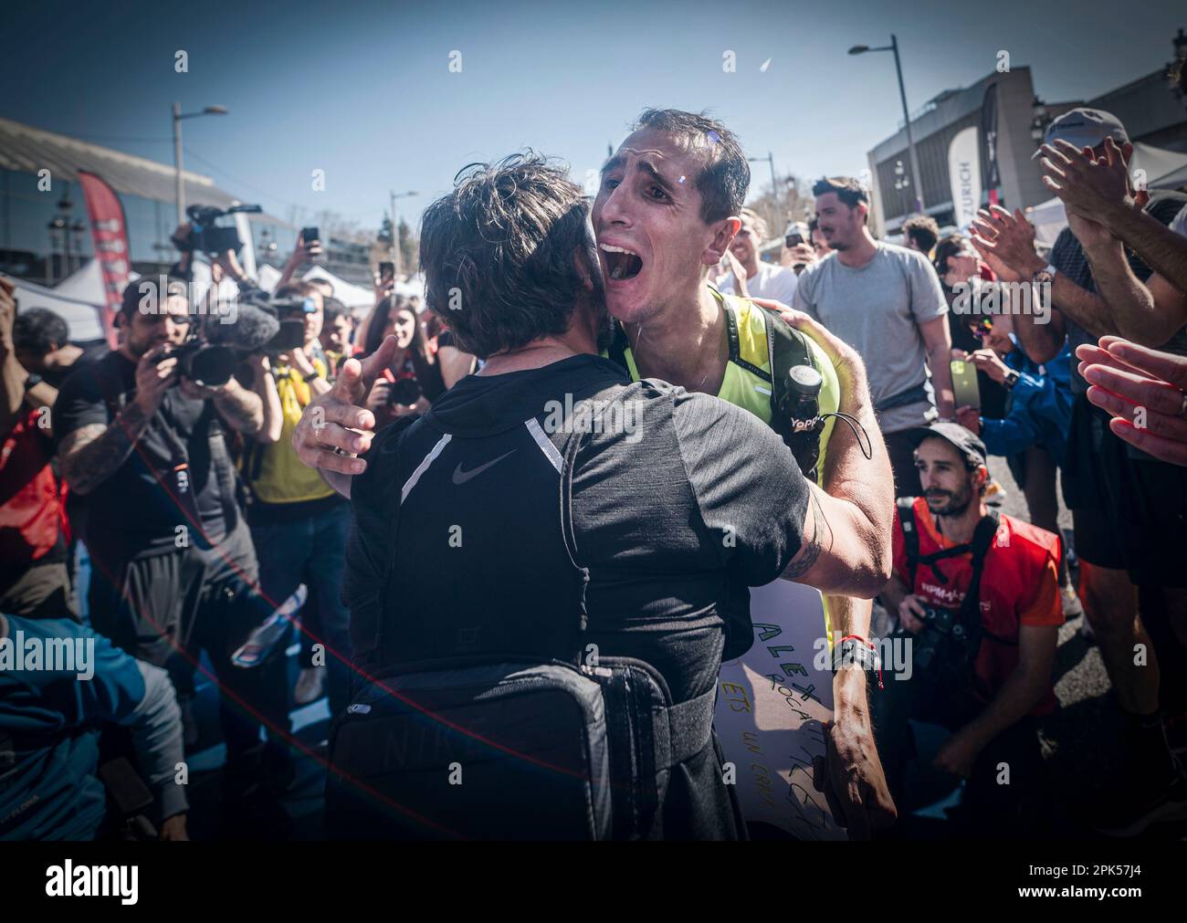 Alex Roca reaching the finish line in his first Barcelona marathon and ...