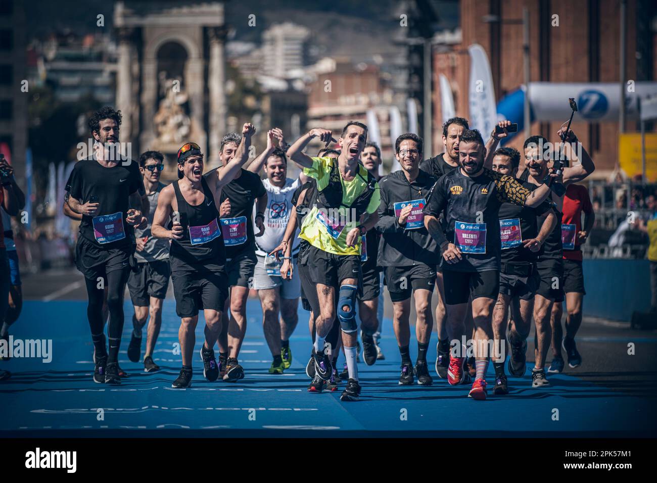 Alex Roca reaching the finish line in his first Barcelona marathon and ...