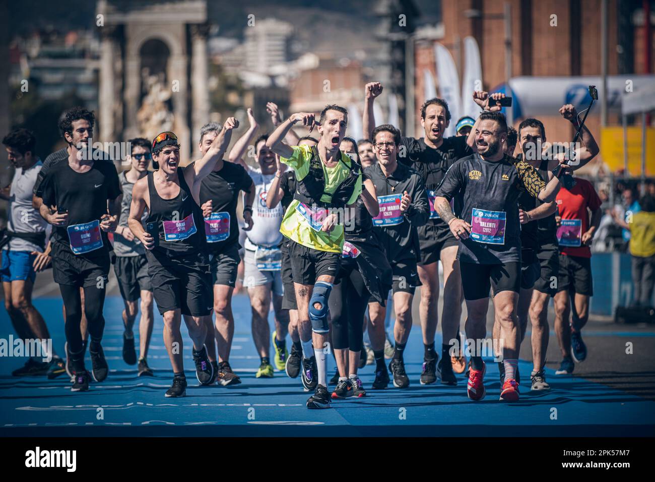 Alex Roca reaching the finish line in his first Barcelona marathon and ...