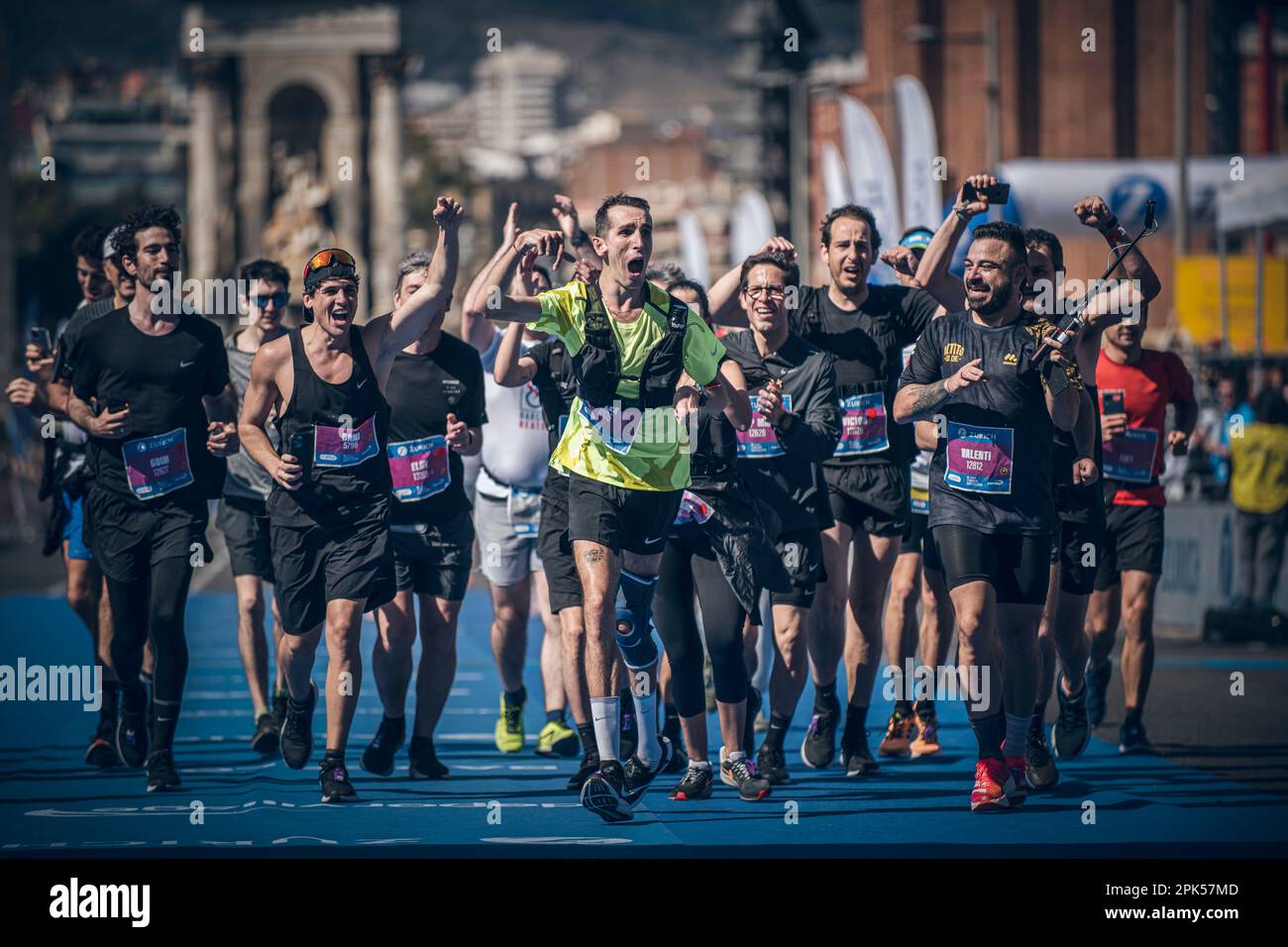 Alex Roca reaching the finish line in his first Barcelona marathon and ...