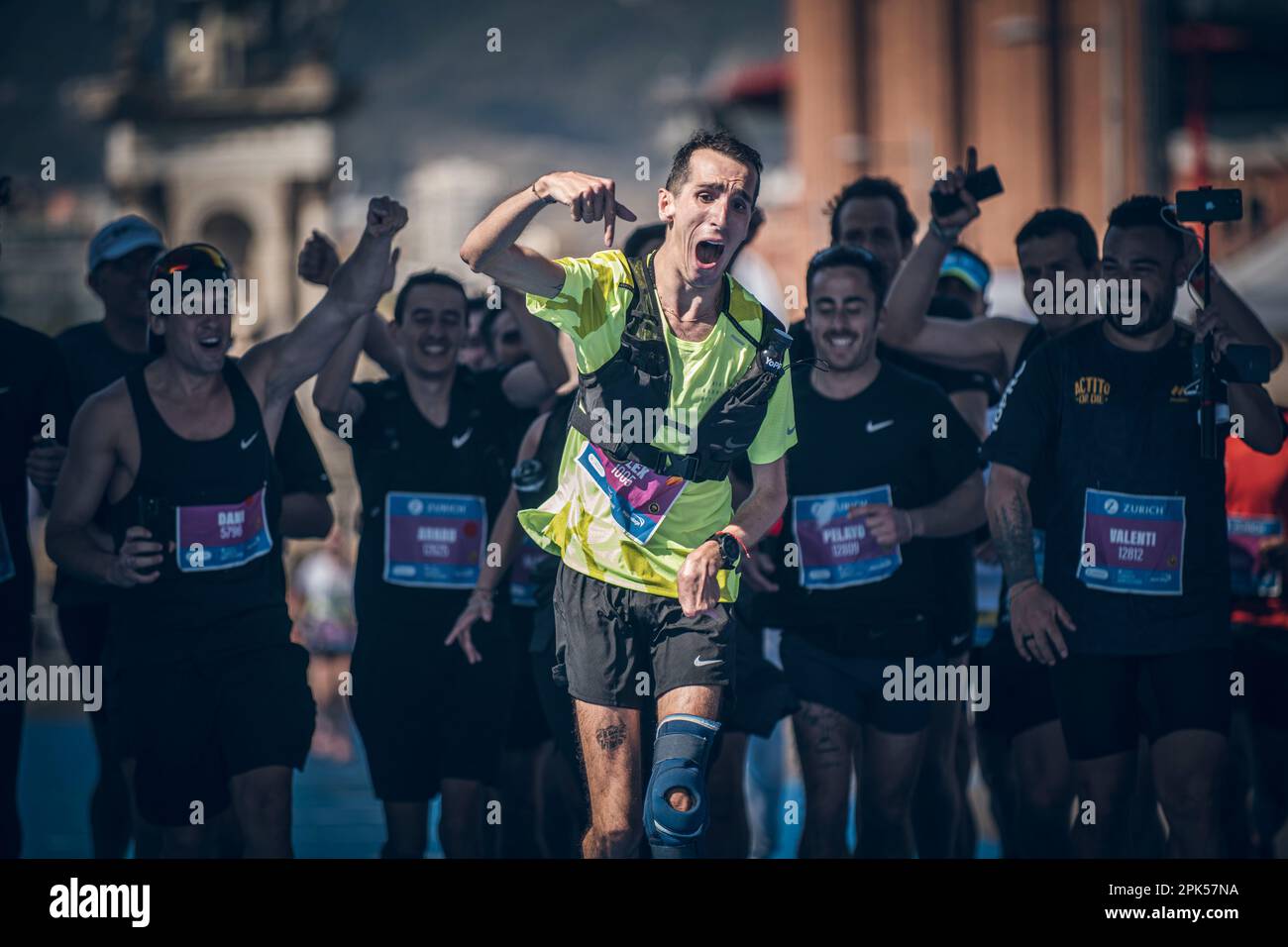 Alex Roca reaching the finish line in his first Barcelona marathon and ...