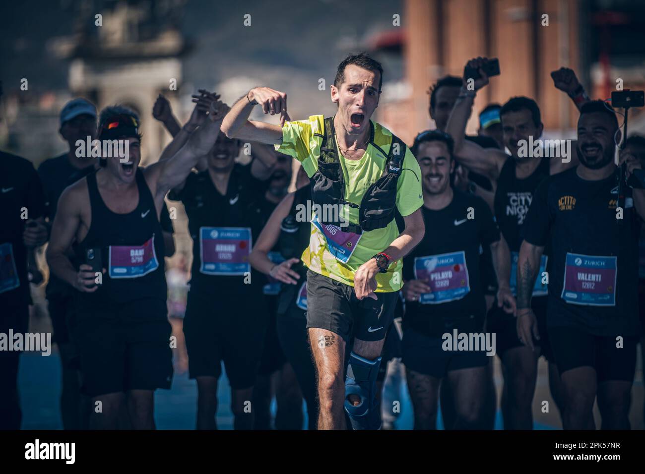 Alex Roca reaching the finish line in his first Barcelona marathon and ...