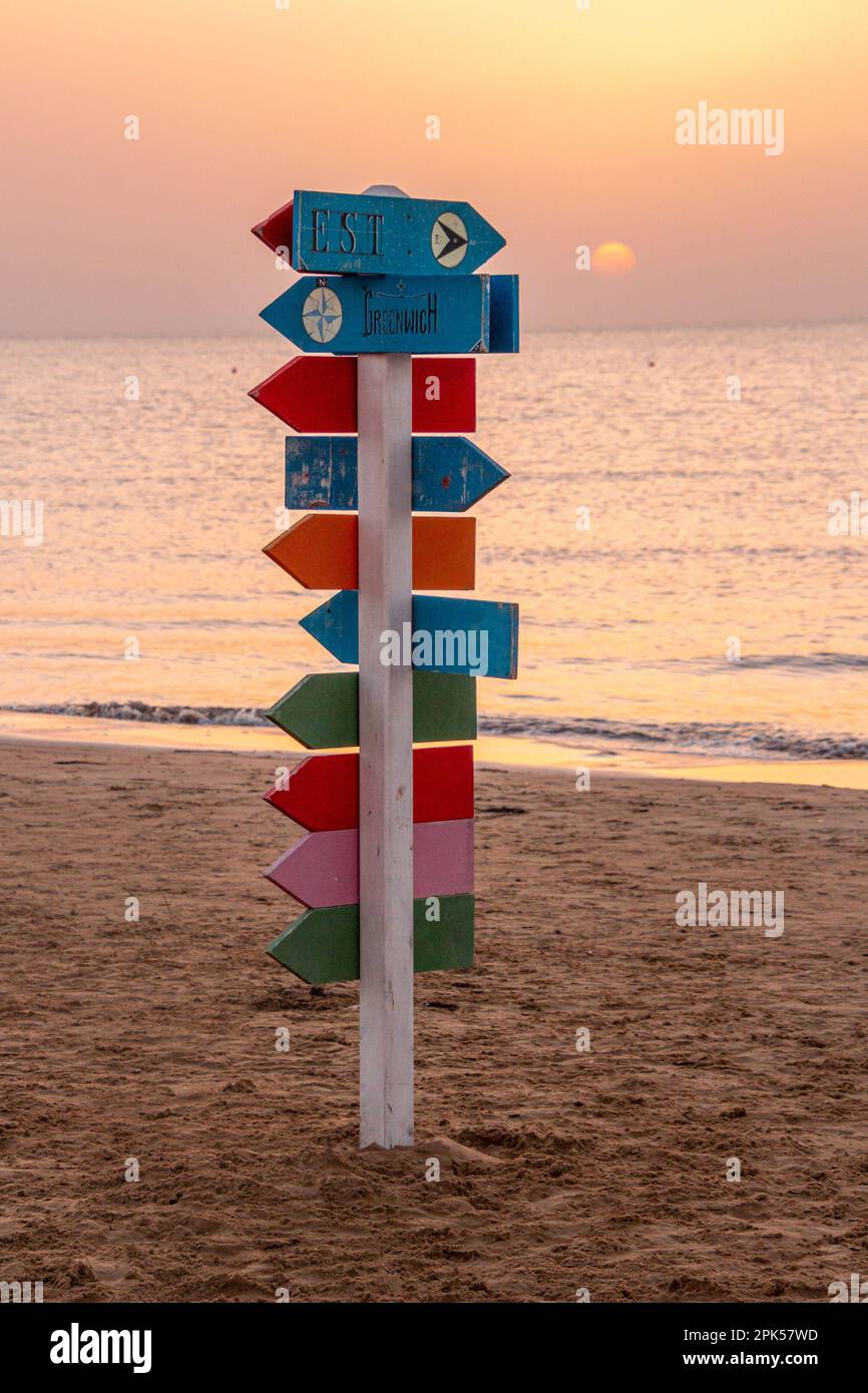 Colorful directional sign at Vieste beach, Italy Stock Photo - Alamy