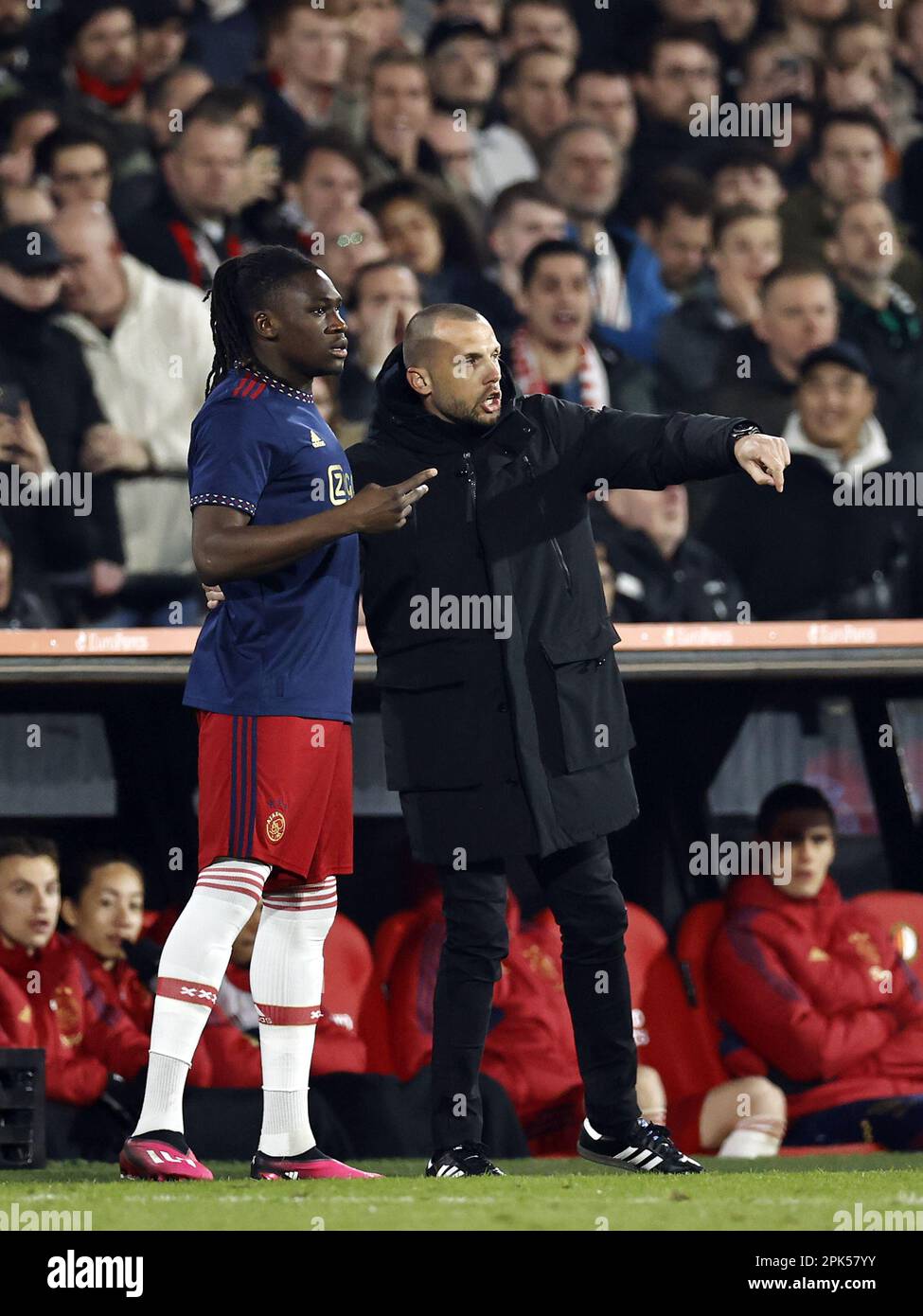 ROTTERDAM - (L-R) Calvin Bassey of Ajax, Ajax coach John Heitinga ...