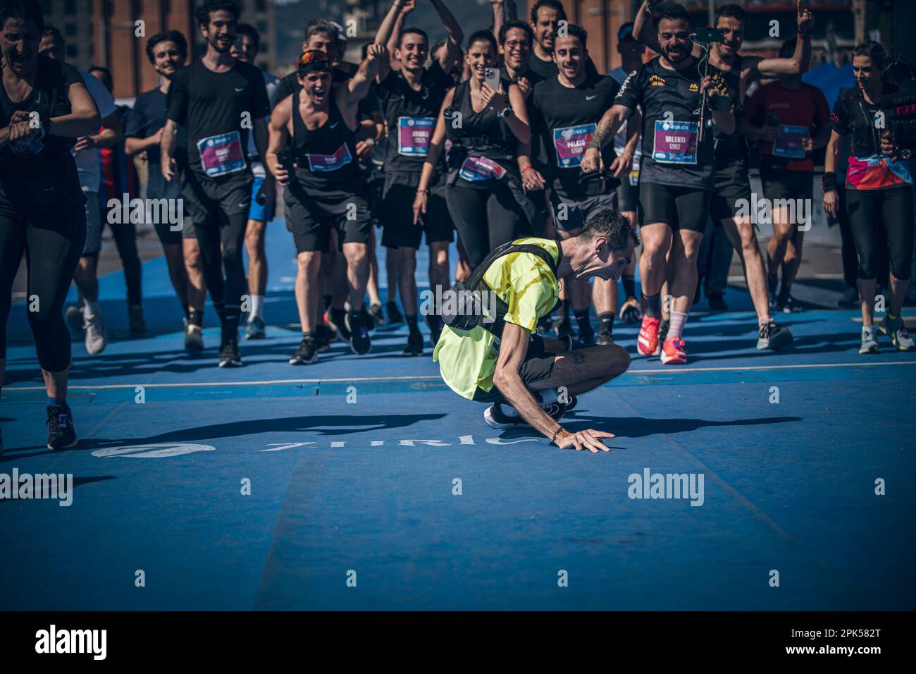 Alex Roca reaching the finish line in his first Barcelona marathon and ...