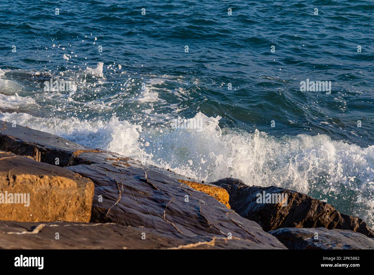 Sea waves on the rocks Stock Photo - Alamy