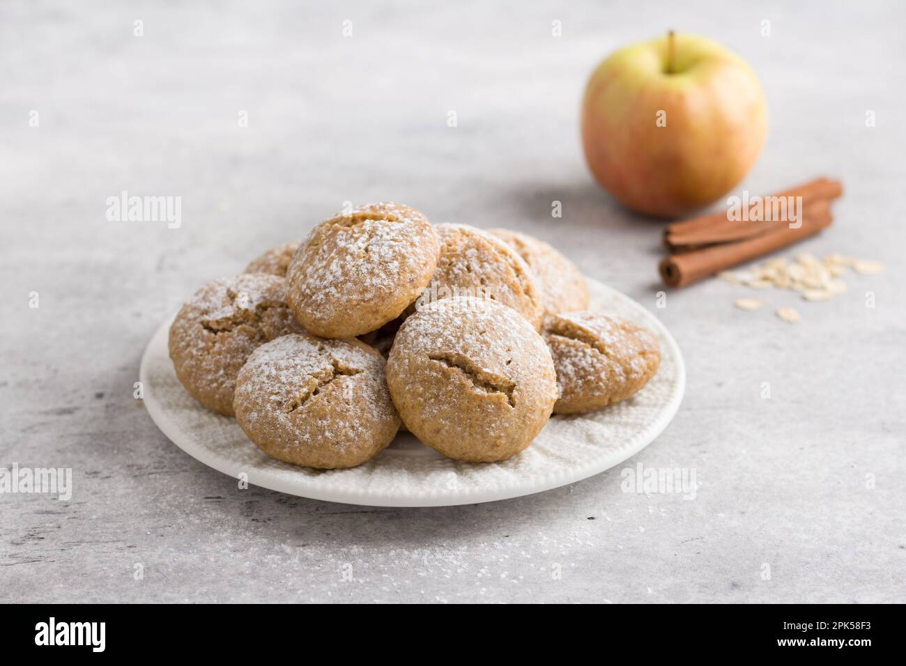 Steamed oatmeal cookies with apple and cinnamon sprinkled with powdered ...
