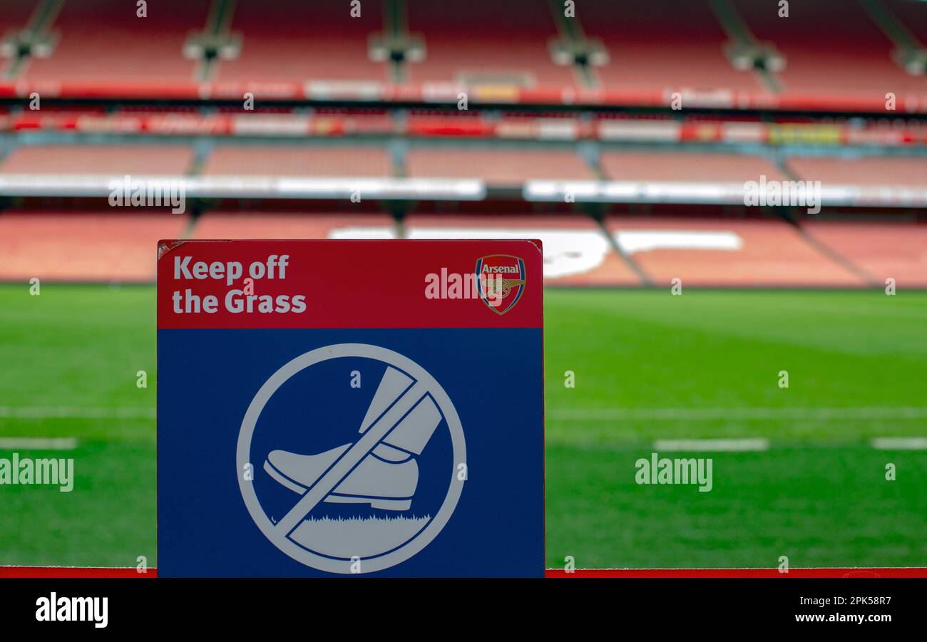 HIGHBURY, LONDON, ENGLAND - Keep off the Grass sign at Arsenal Emirates ...