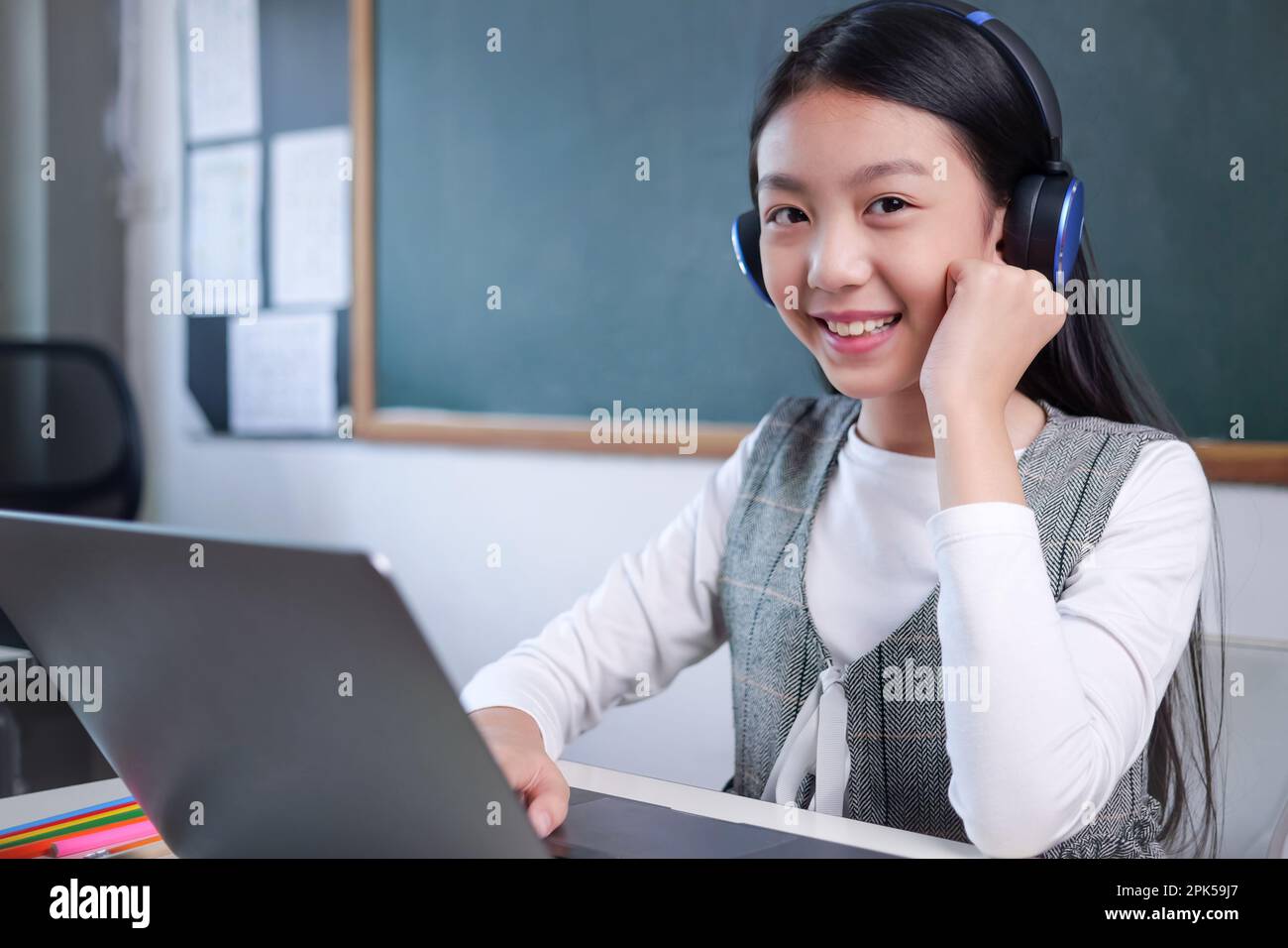 Student studying and reading textbook with happiness in classroom Stock ...