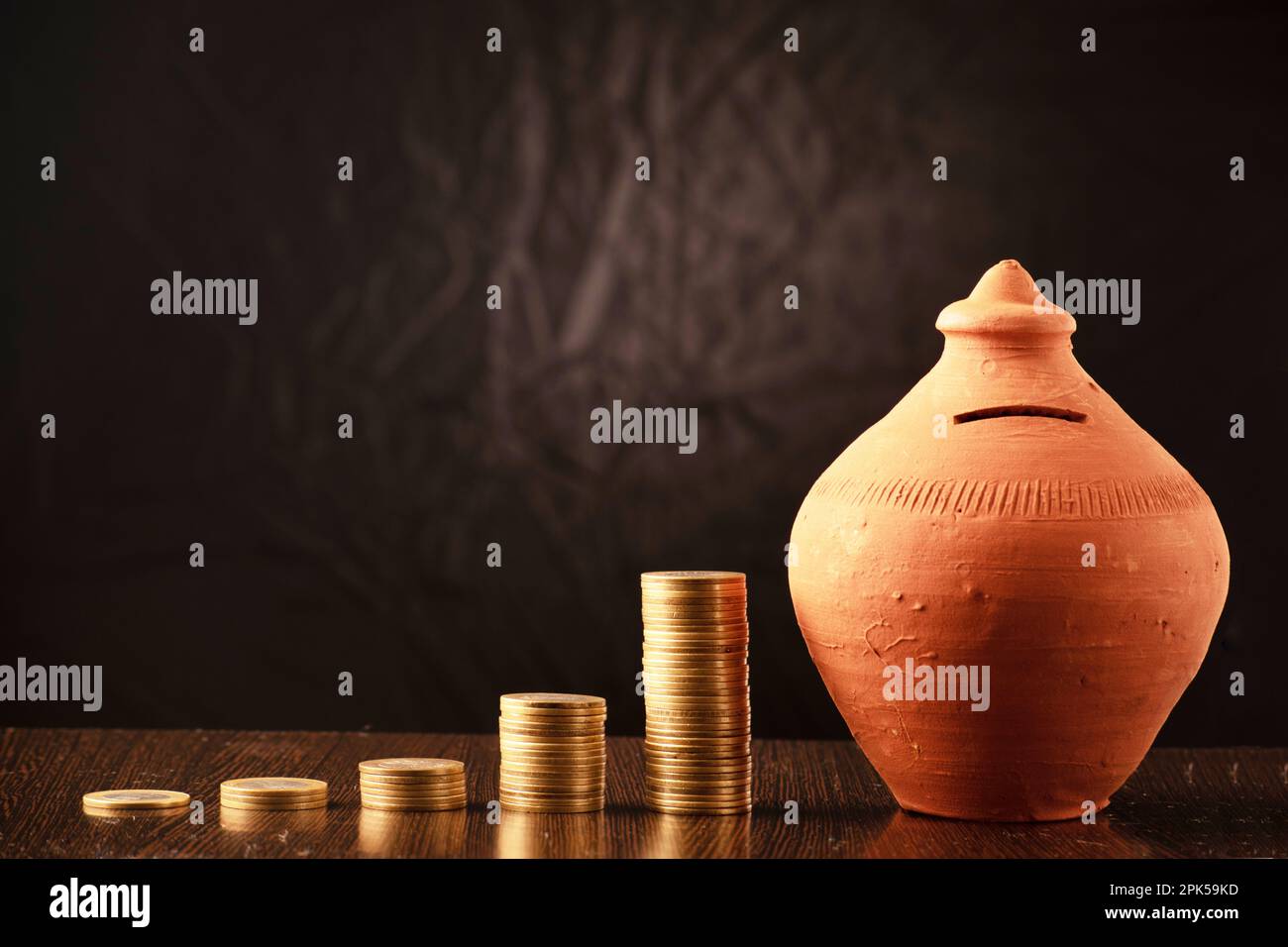 Gullak with coin small saving concept in india Stock Photo - Alamy