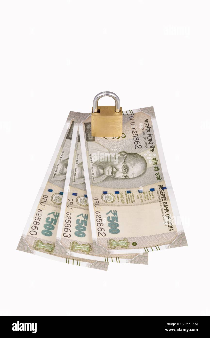 Indian currency note with lock isolated on white background Stock Photo ...
