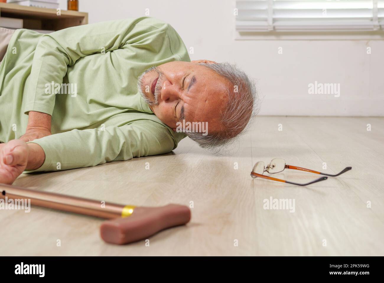 Elderly people accident slip and fall, Accident of senior slip and fall to floor Stock Photo - Alamy