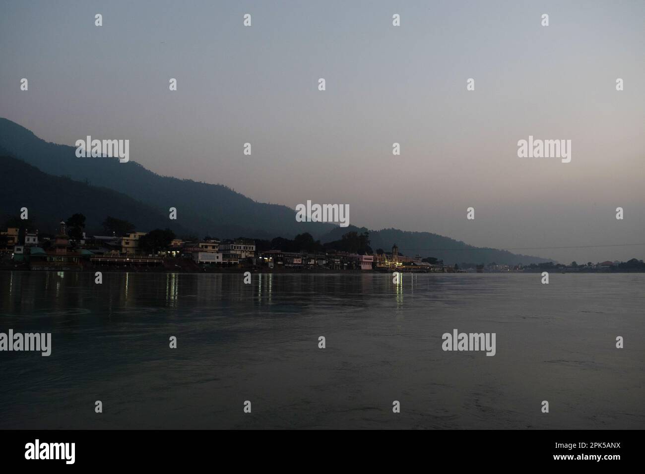 Evening view of ganga ghat at rishikesh Stock Photo - Alamy