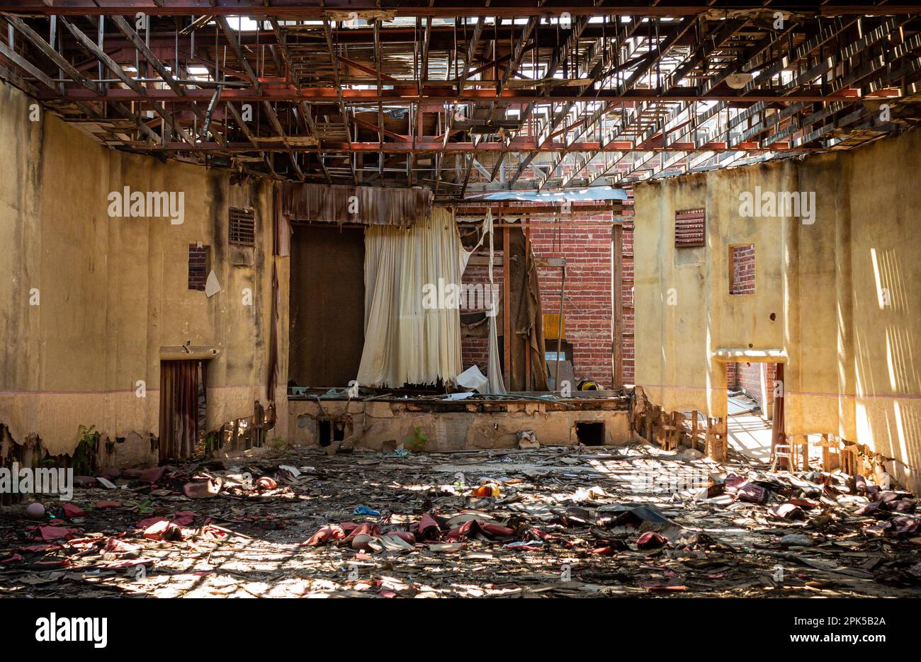 Warm Abandoned and Decaying Building with a Movie Theater Screen with ...