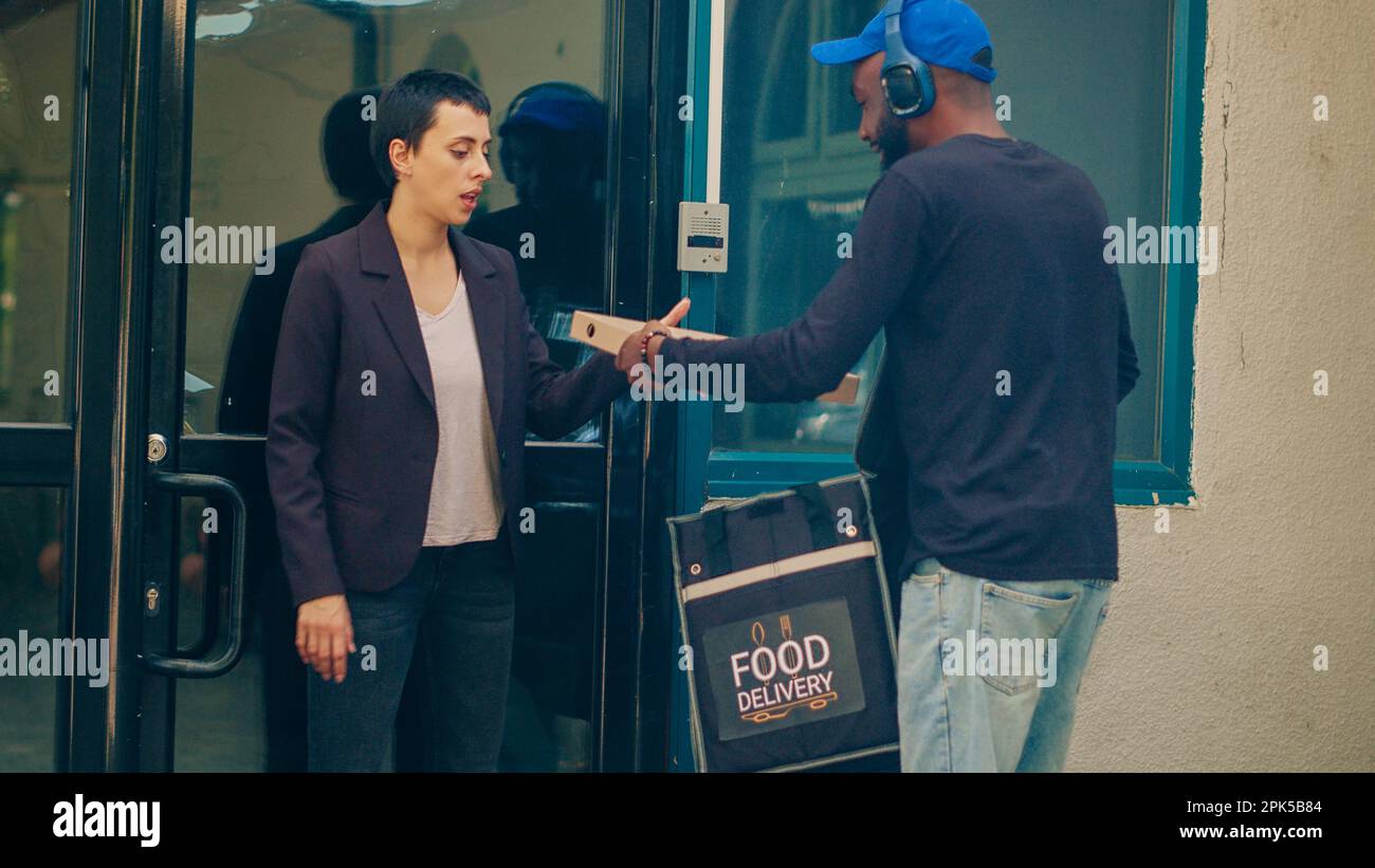 Woman delivery driver ringing hi-res stock photography and images - Alamy