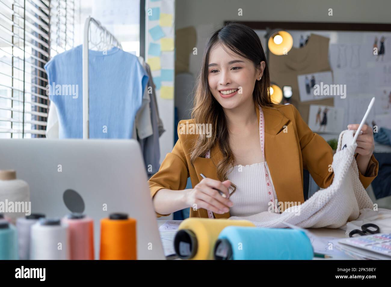 Female designer business owner, Tailoring business owner Stock Photo ...