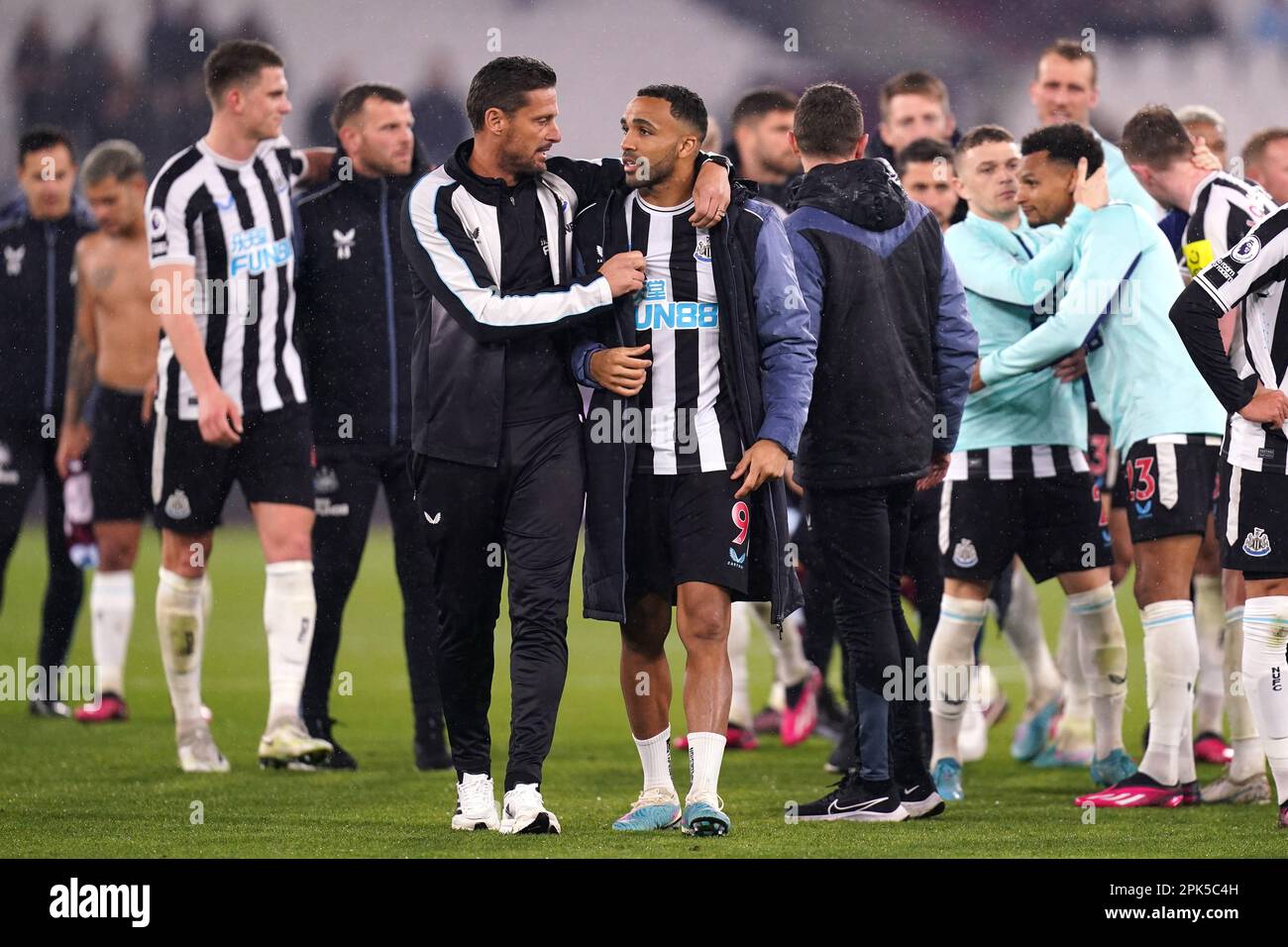 Newcastle United assistant manager Jason Tindall greets Callum Wilson ...