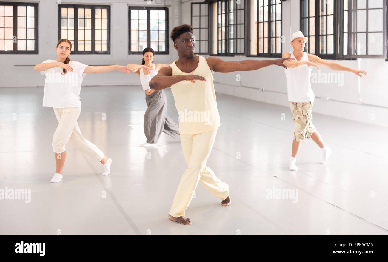 Dancers training modern dance movements Stock Photo - Alamy