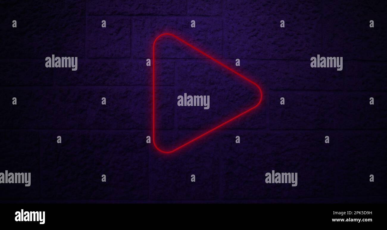 Image of red neon arrow icon on brick background Stock Photo - Alamy