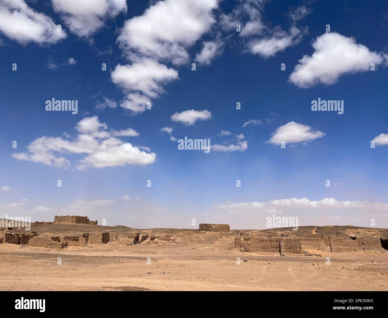 Merzouga, Morocco, Africa: panoramic road in the Sahara desert, ruined ...