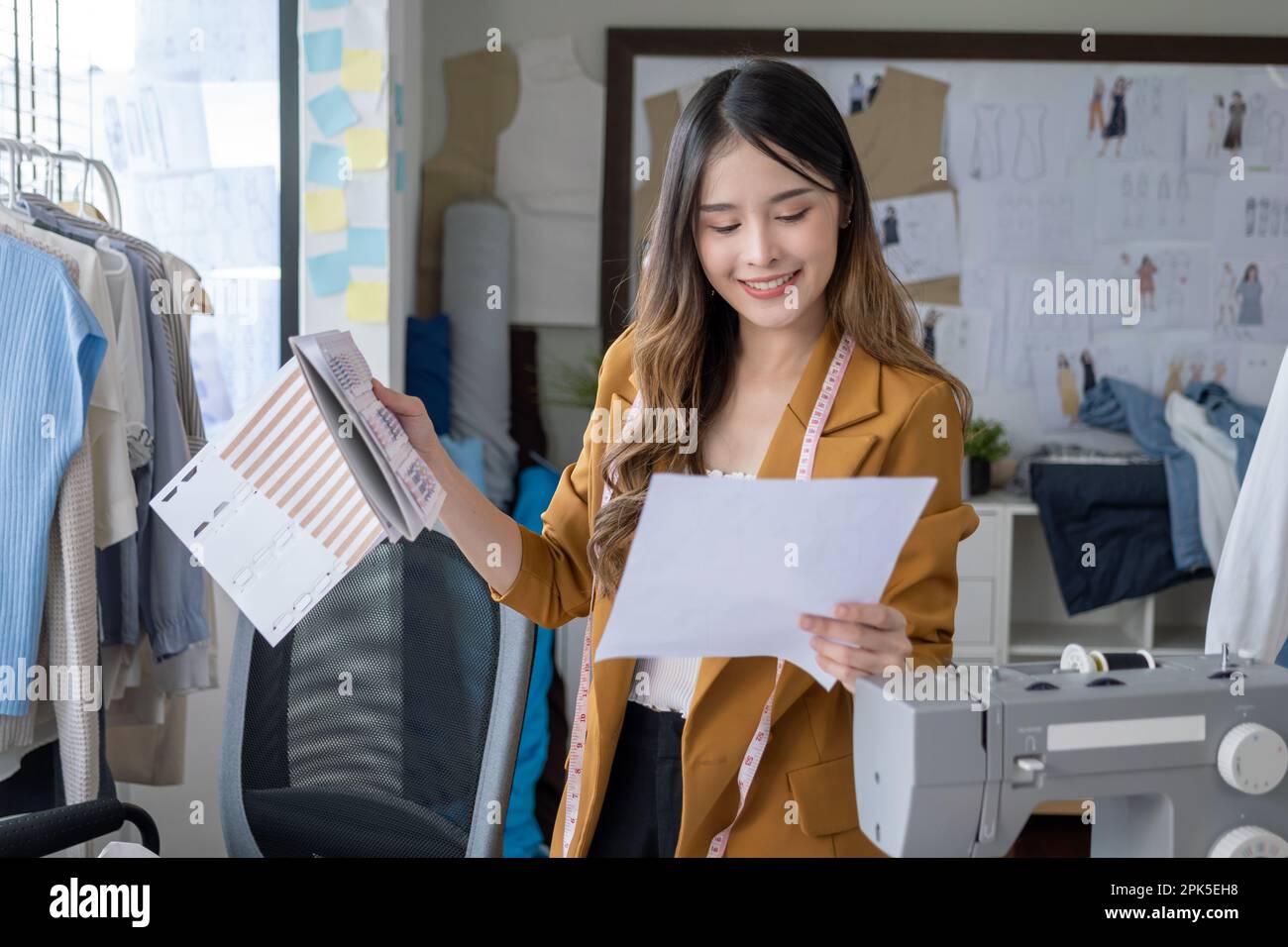 Female designer business owner, Tailoring business owner Stock Photo ...