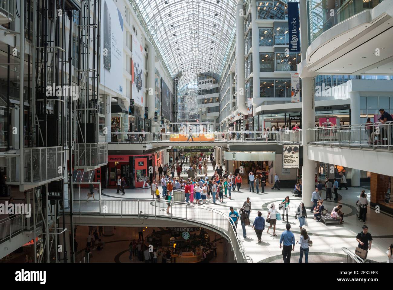 Visitors and shoppers in the Toronto Eaton Centre a shopping centre and ...