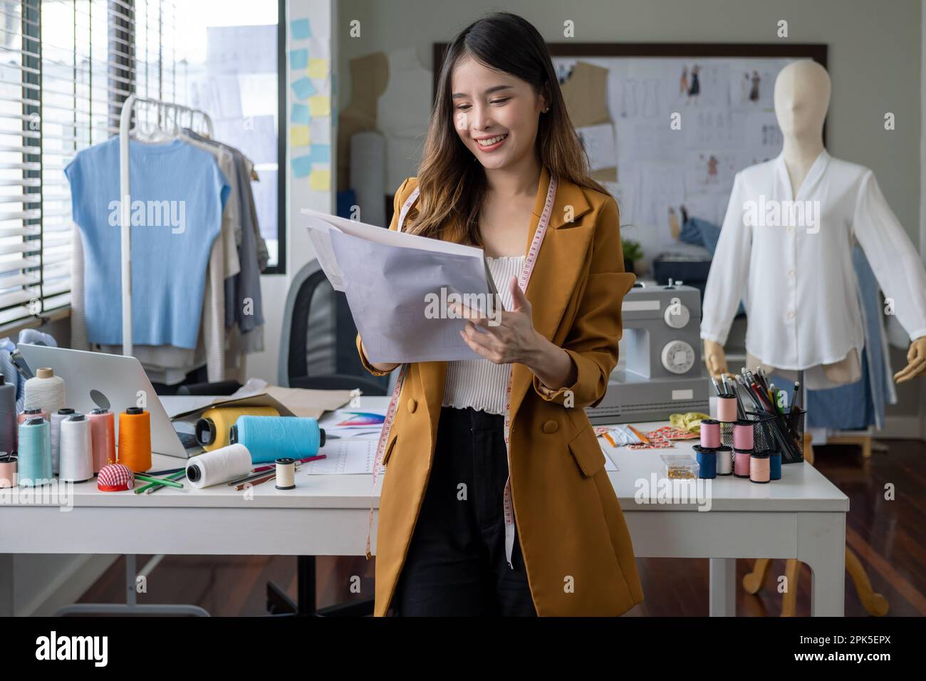 Female designer business owner, Tailoring business owner Stock Photo ...