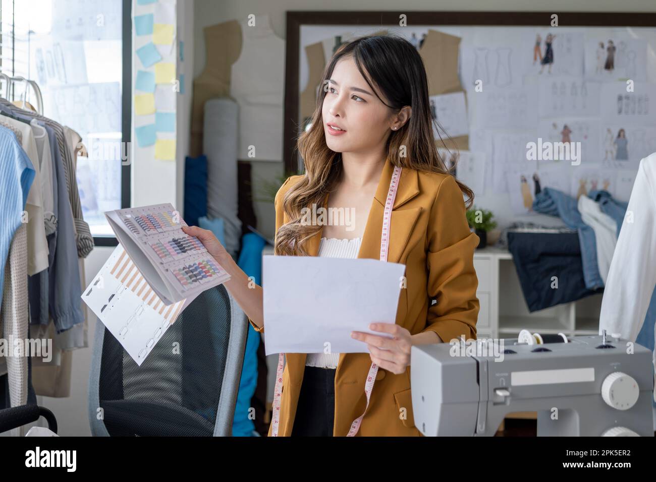 Female designer business owner, Tailoring business owner Stock Photo ...